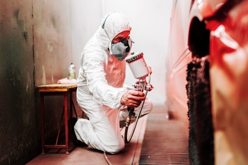 Why Do Painters Wear White? - Practical Workwear Guide